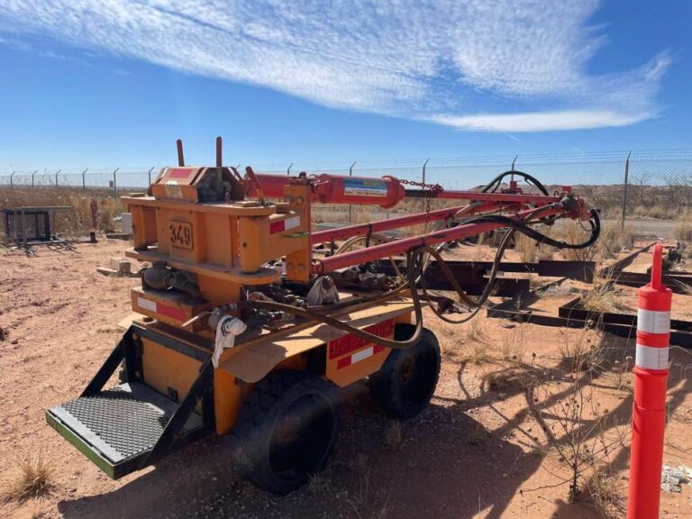 2-Boom Long Tom Drill Rigs- Nelson Machinery & Equipment Ltd.
