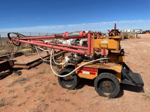 2-Boom Long Tom Drill Rigs- Nelson Machinery & Equipment Ltd.