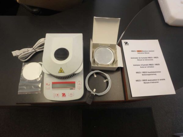OHAUS MB25 MOISTURE ANALYZER - Nelson Machinery & Equipment Ltd.